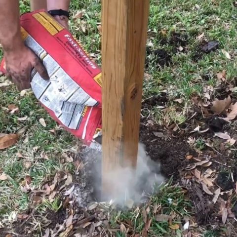 How to Set Wooden Fence Posts in Concrete - Easy Steps & Video ...