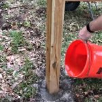 How to Set Wooden Fence Posts in Concrete - Easy Steps & Video ...
